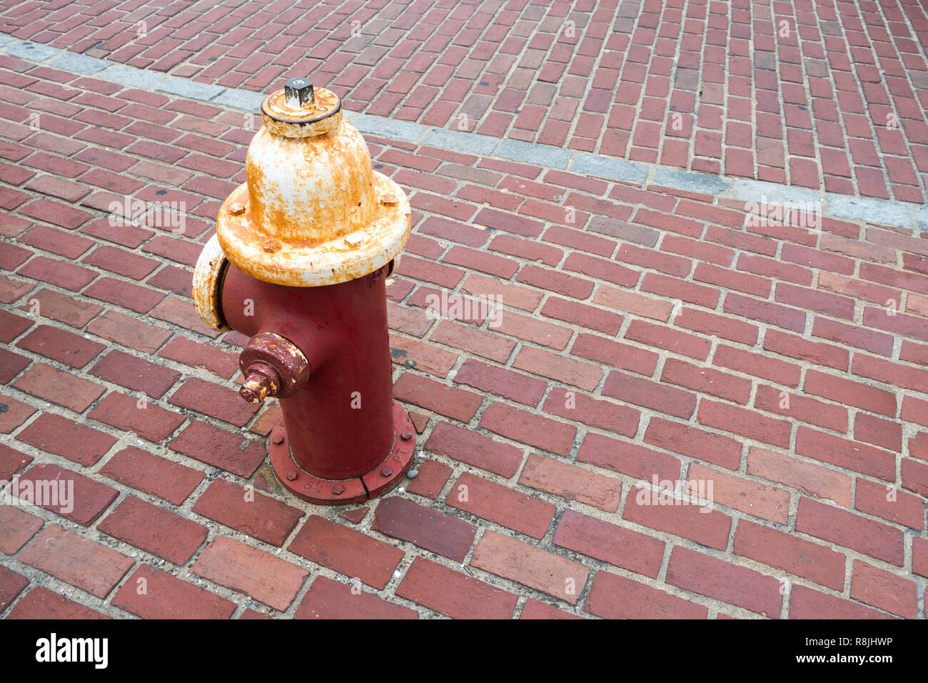 red white rusted fire hydrant city, water pressure Stock Photo - Alamy