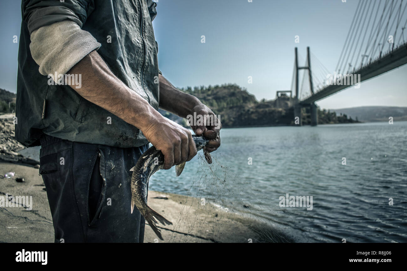 Sculpture fisherman with net hi-res stock photography and images - Alamy