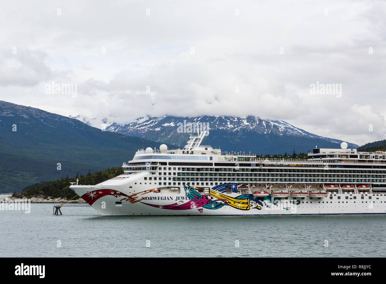 Colorful Ship Under Mountains Stock Photo - Alamy