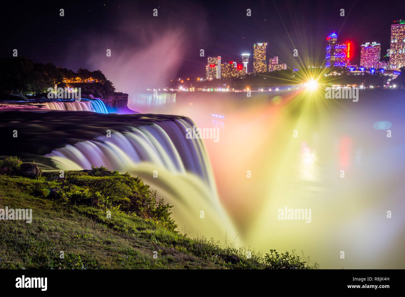 Niagara Falls at night with the Canadian skyline Stock Photo - Alamy
