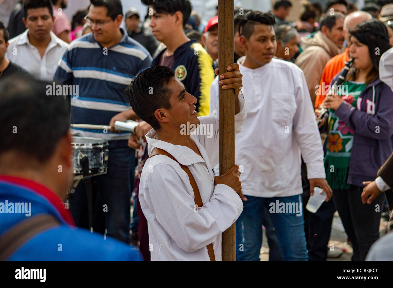 A Mexican man performing a traditional ritual at the Basilica of Our ...