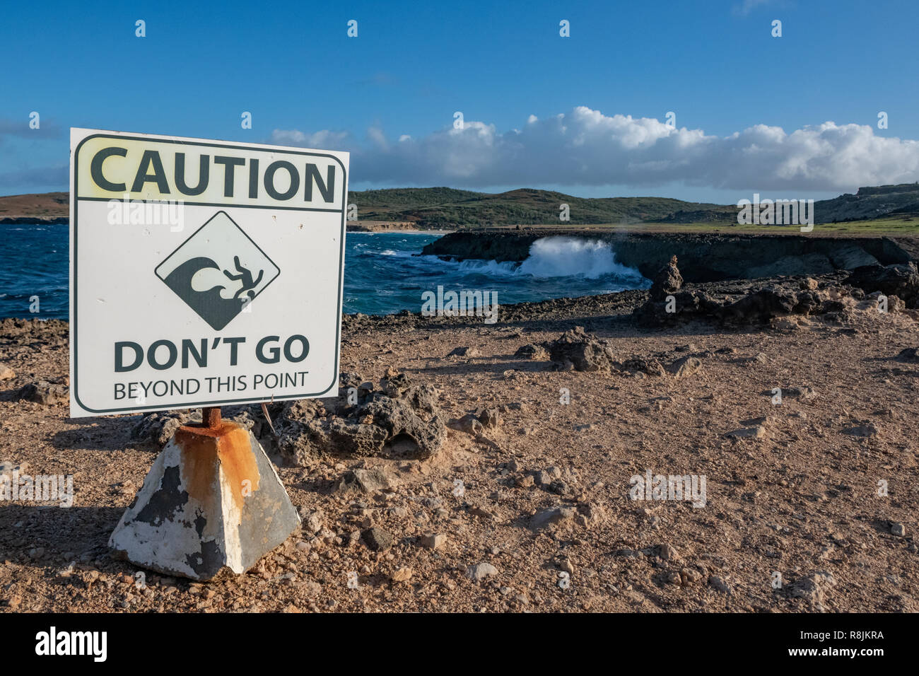 Natural bridge Aruba - rogue waves warning sign found in Arikok ...