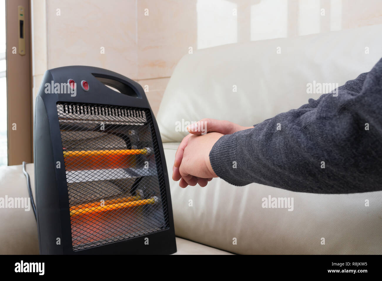 Hands on heater hi-res stock photography and images - Alamy
