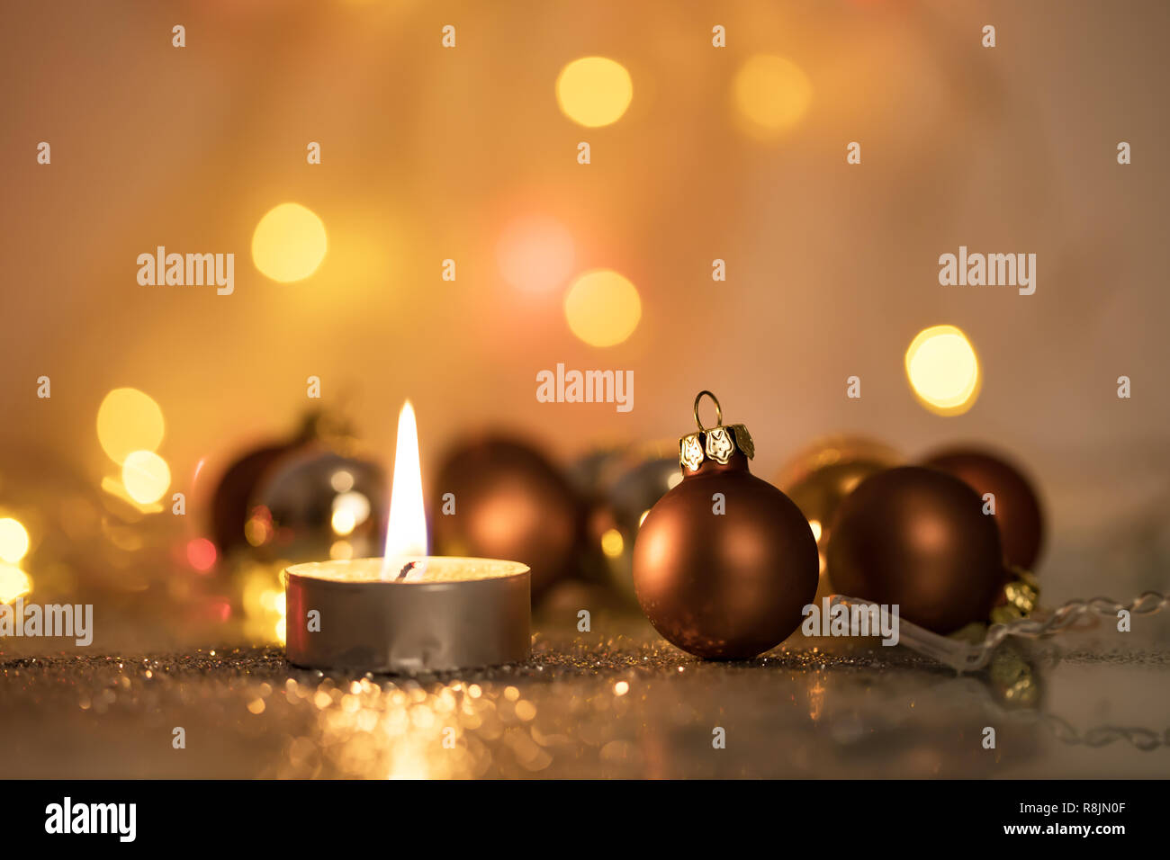 Magic golden holiday glitter background with candles and Christmas ...