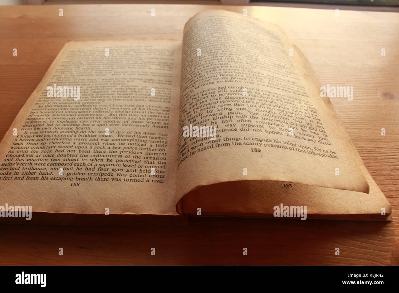 A dog-eared paperback book Stock Photo - Alamy