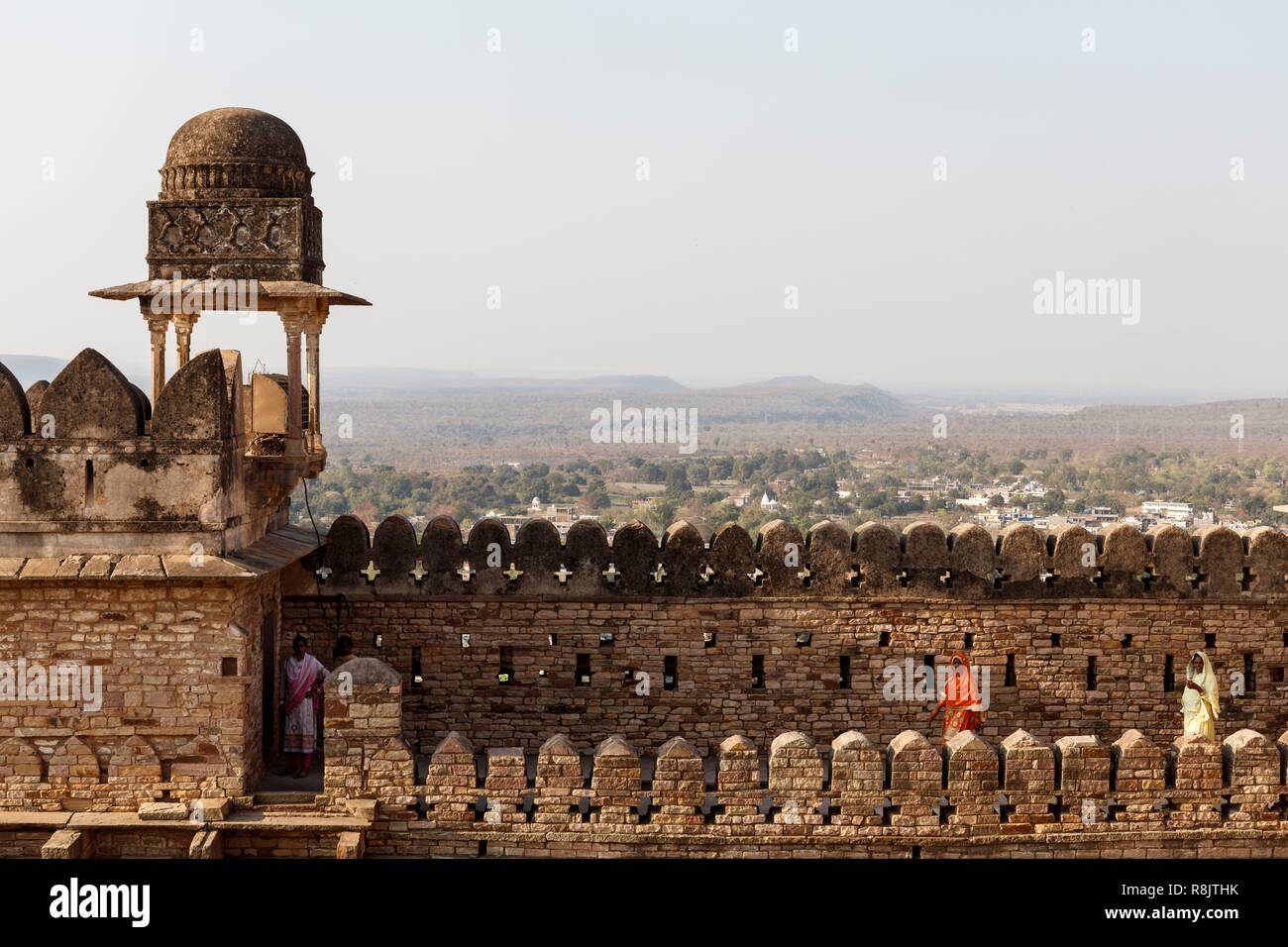 India, Madhya Pradesh, Chanderi, three women on Chanderi Fort ramparts ...