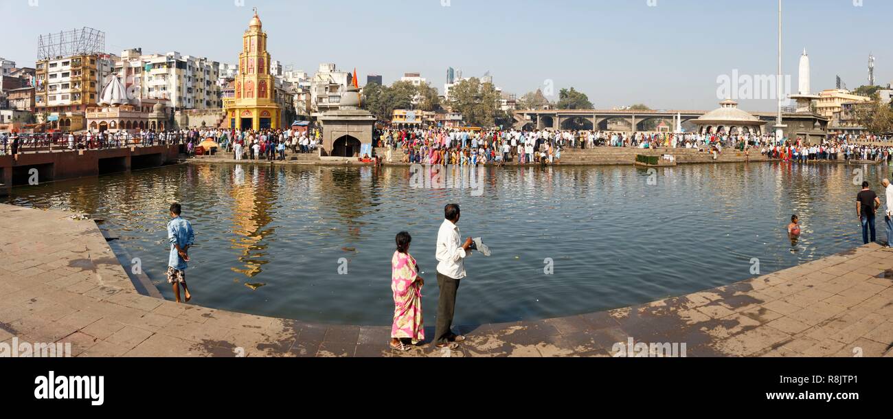 India, Maharashtra, Nashik, large crowd on the ghats on Godavari river ...