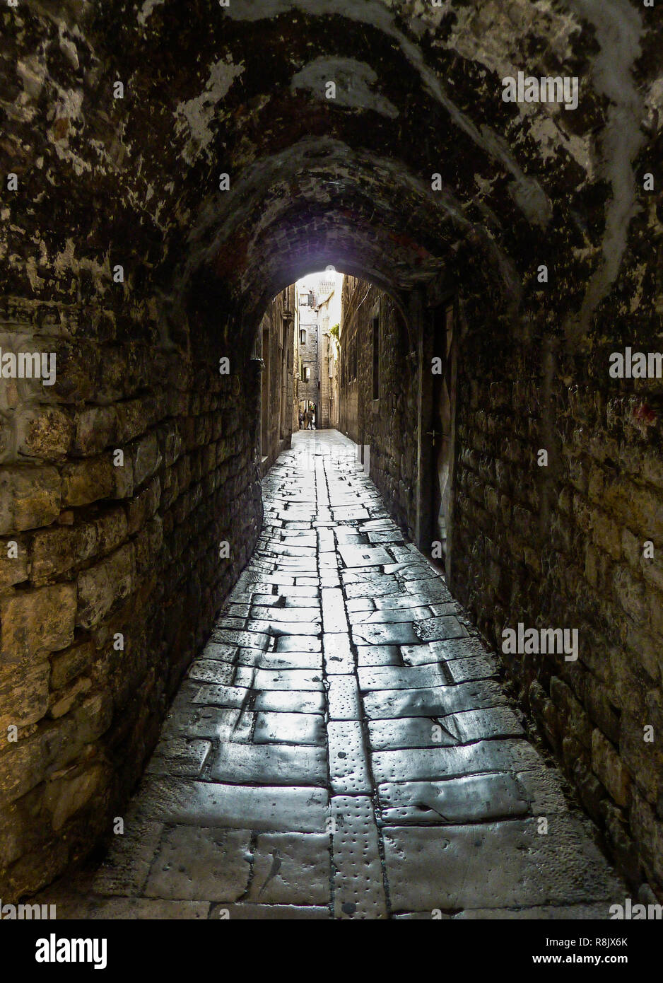 View along a tunnel / alley in Split, Croatia Stock Photo - Alamy