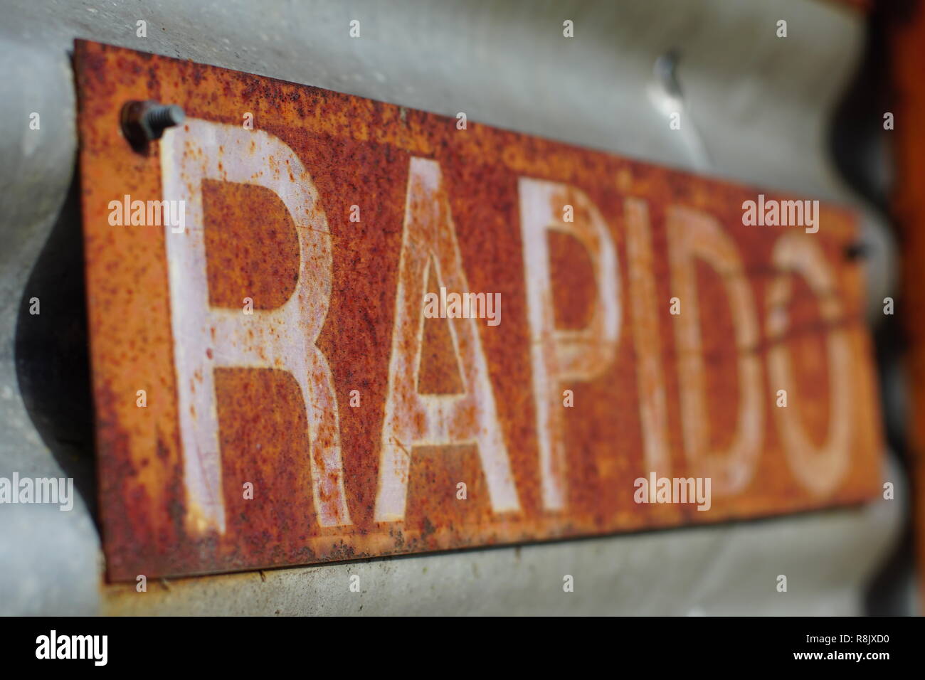 old rusty sign on an old machine Stock Photo - Alamy