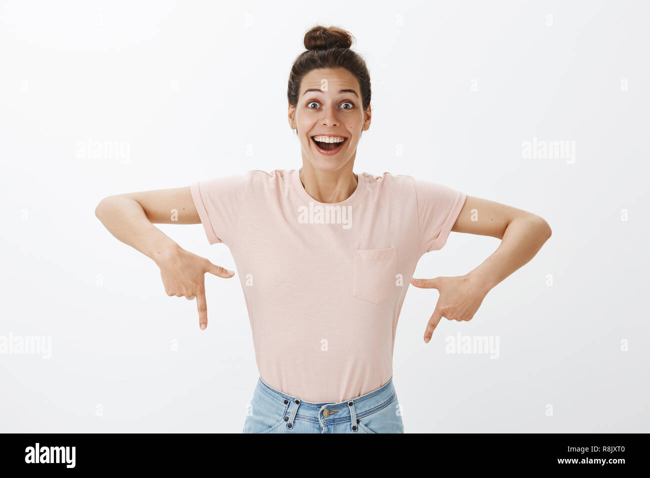Waist-up shot of excited impressed and happy young woman reacting to ...
