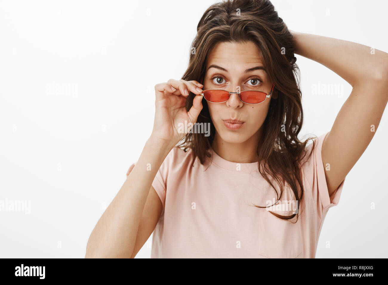 Woman taking sunglasses off hi-res stock photography and images - Alamy