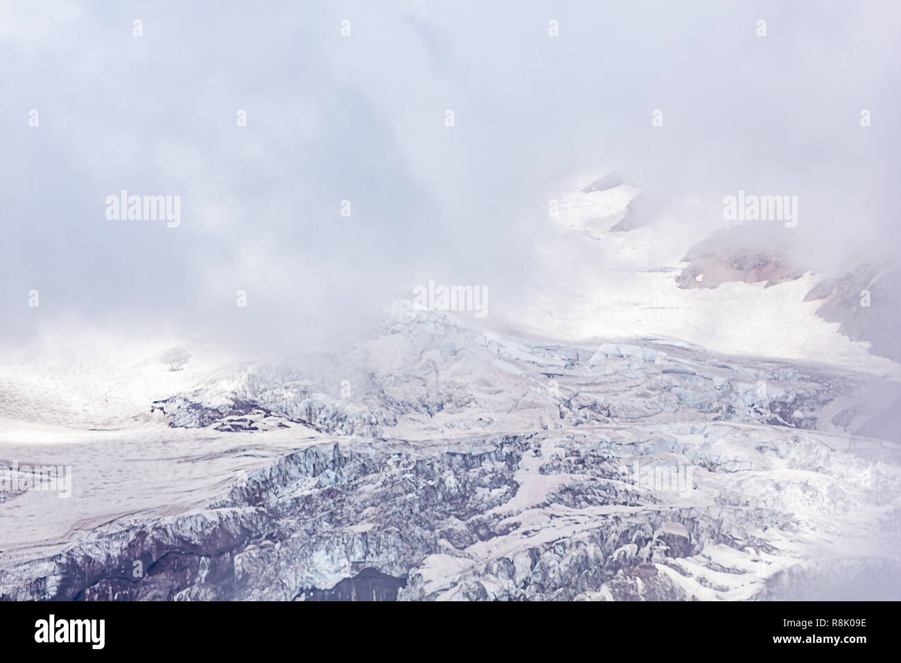 white cold snow fields in mist on mountain side Stock Photo - Alamy