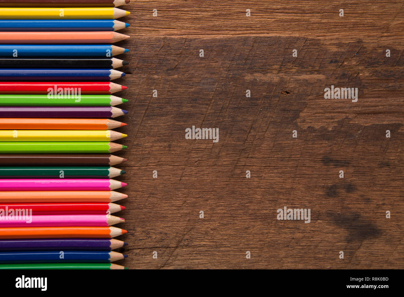 Group of colorful pencils on the wood table background artwork gallery ...