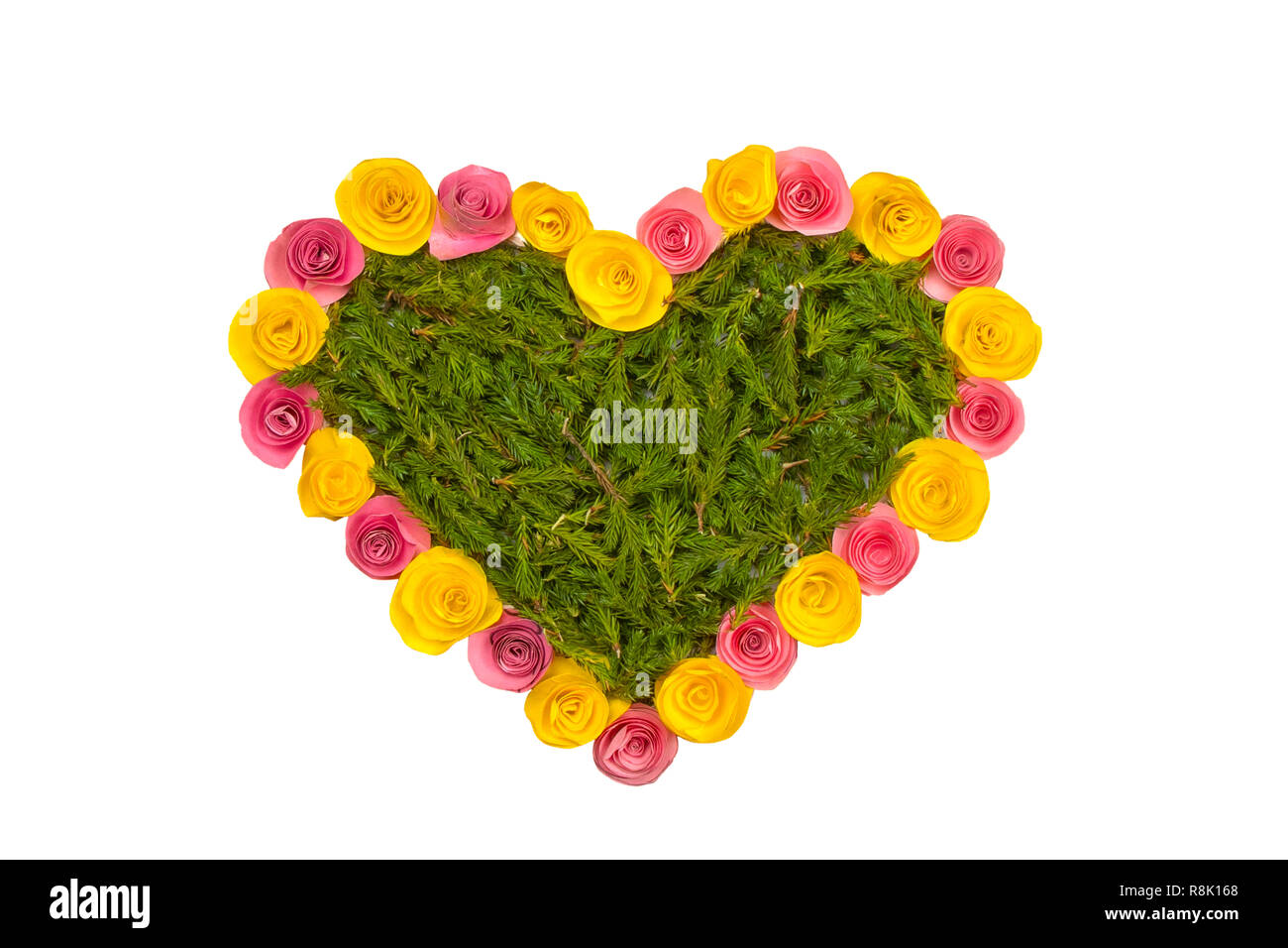 Heart shape craft made with color paper and christmas tree, on white ...
