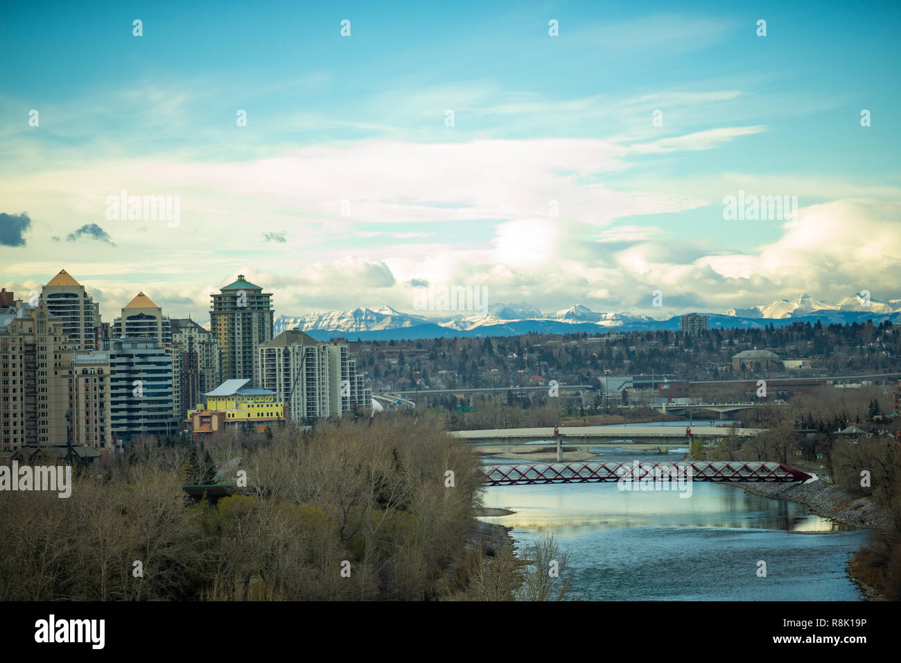 View of downtown Calgary with bridges and the rockies Stock Photo - Alamy