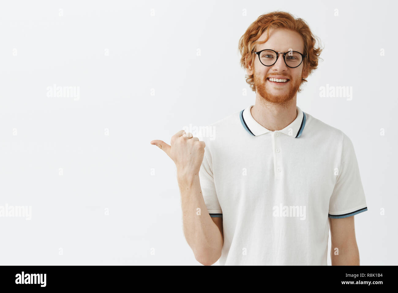 Pointing behind with her thumb hi-res stock photography and images - Alamy