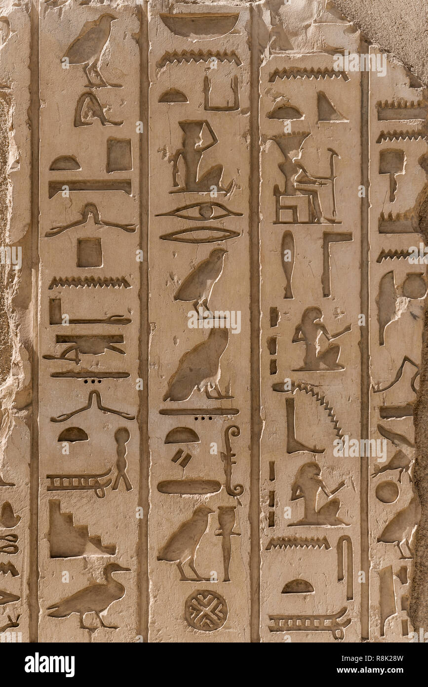 Egyptian Pharaoh Alphabet Engraved on Stone Wall Stock Photo - Alamy