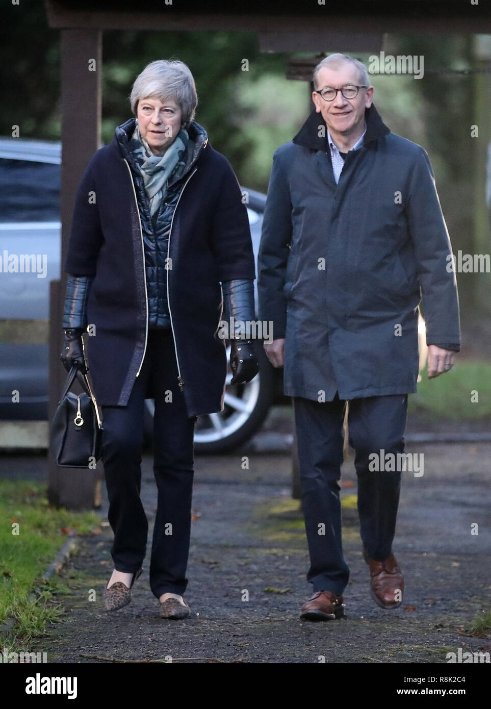 Prime Minister Theresa May and her husband Philip arrive to attend a ...