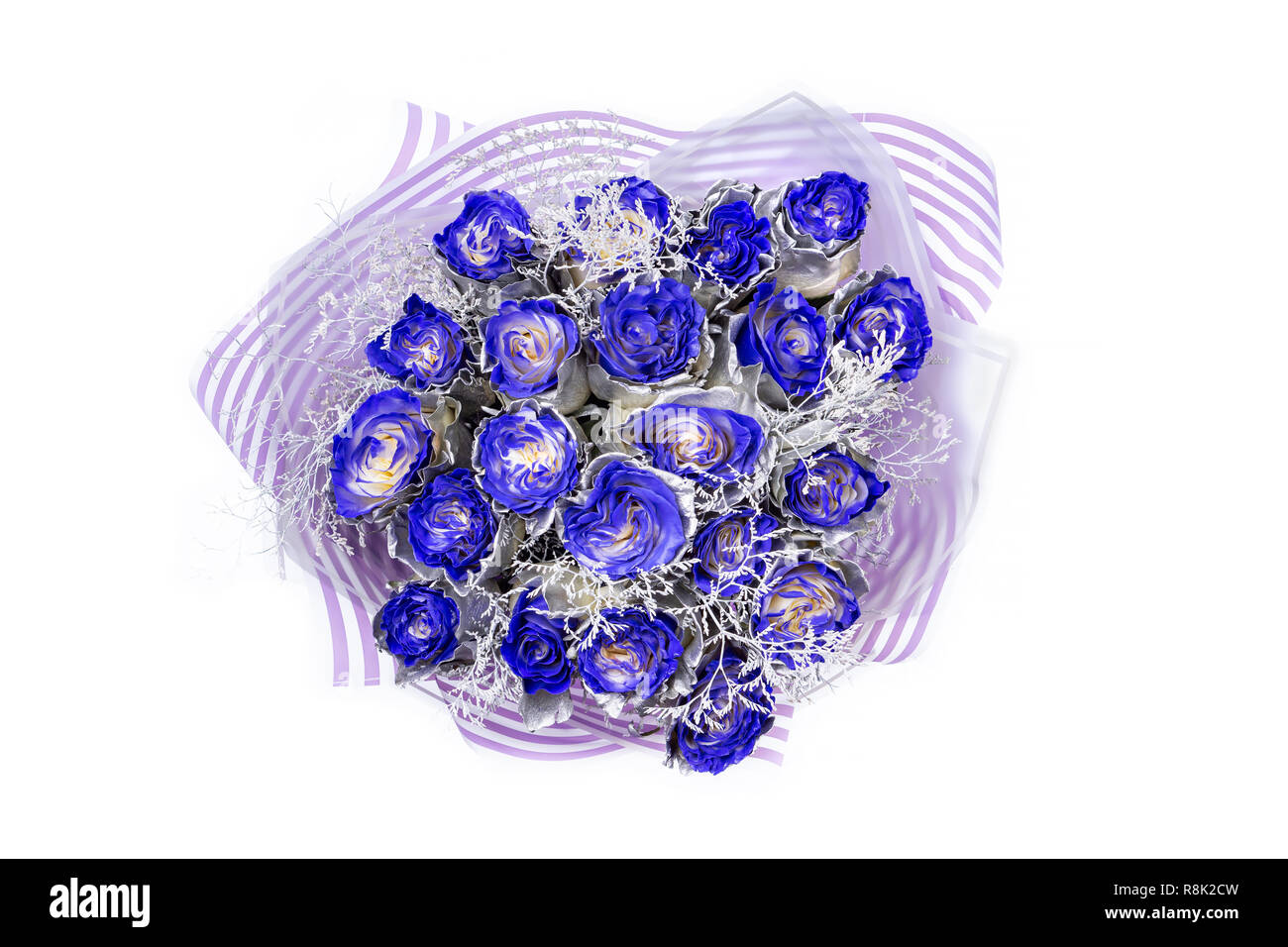 Bouquet of twenty one blue roses from top, silver coloring on the ...
