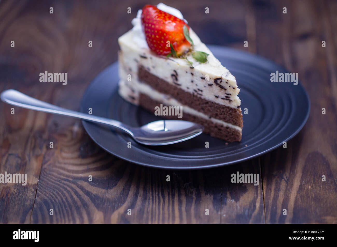 Chocolate and cheese cake on distressed wood background Stock Photo - Alamy