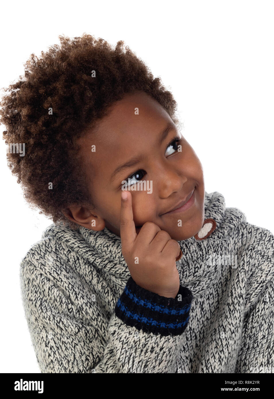 Adorable afroamerican child thinking isolated on a white background ...