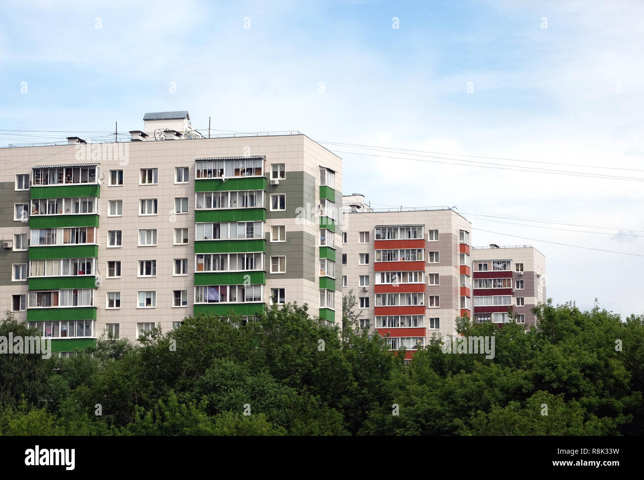 Dense urban development of apartment buildings in the green area of the ...