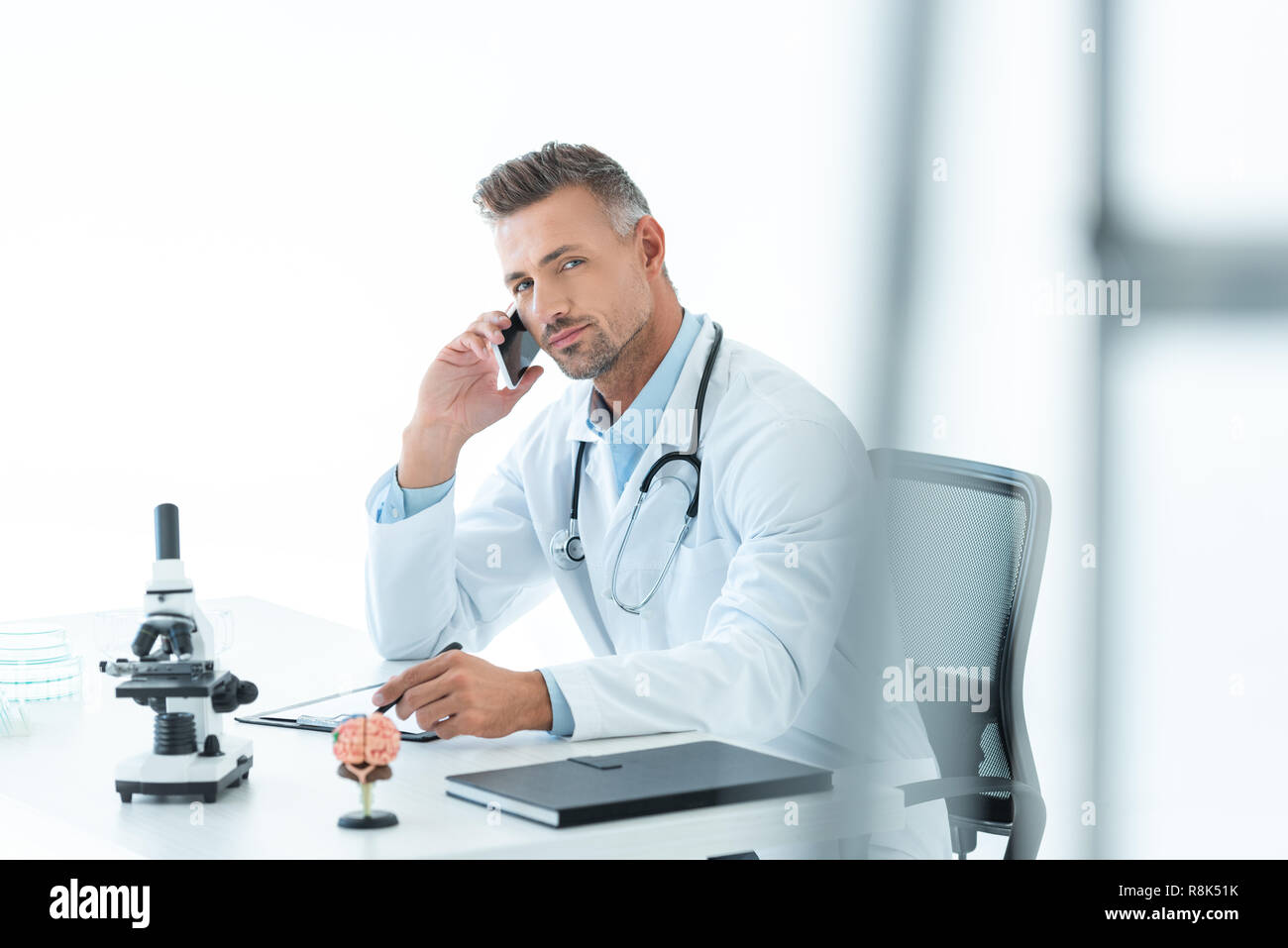 Handsome scientist looking camera hi-res stock photography and images ...