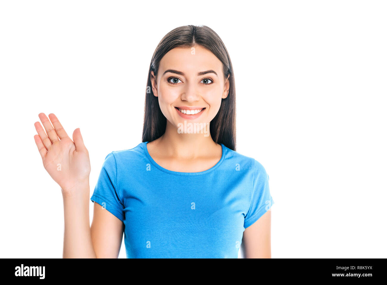 portrait of attractive positive woman waving to camera isolated on ...