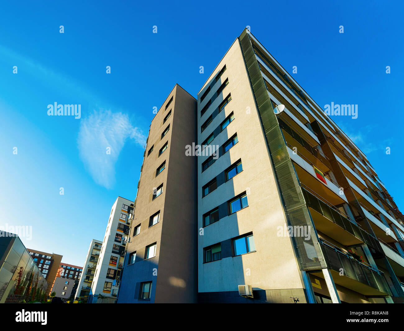 Facade of a modern block residential home apartment house building ...