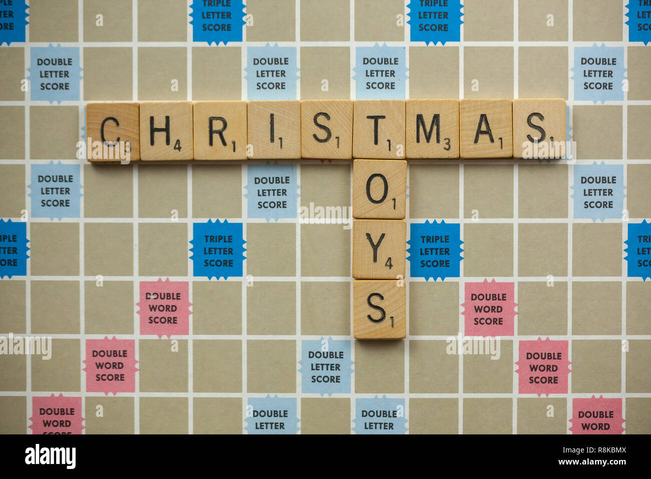 Spelling out words with scrabble tiles hi-res stock photography and ...