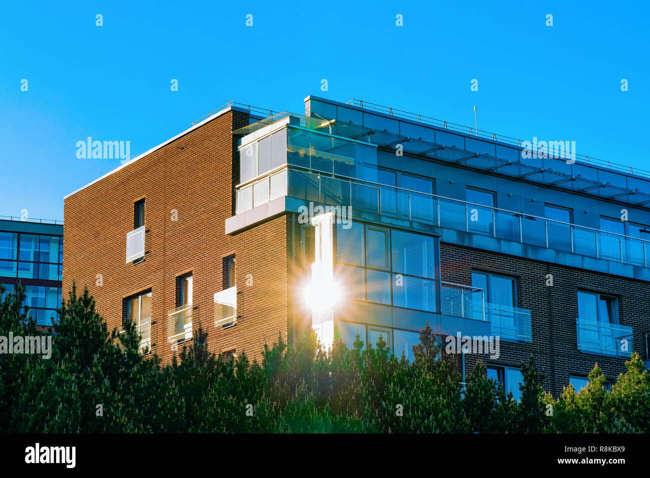 Modern apartment building architecture concept. Sunshine sun flare ...