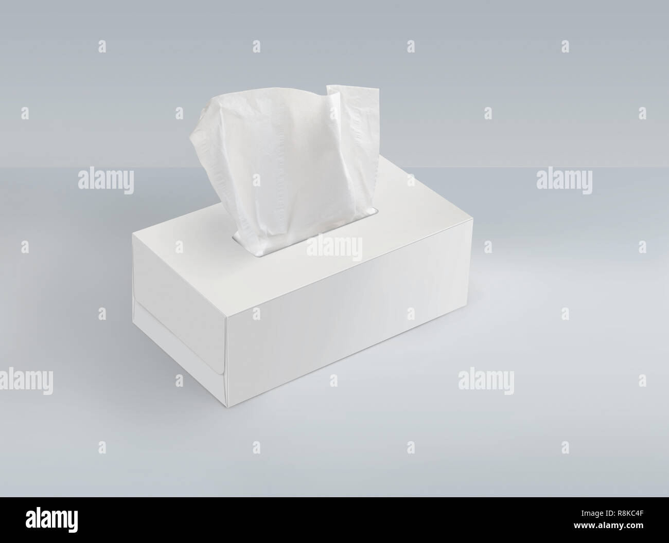 White blank tissue box on light blue background with facial tissue for ...