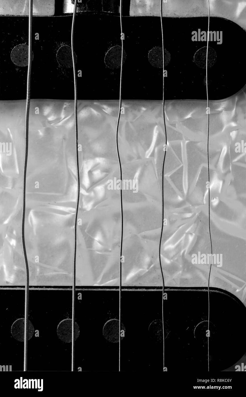 Wavy guitar strings on an electric guitar Stock Photo - Alamy