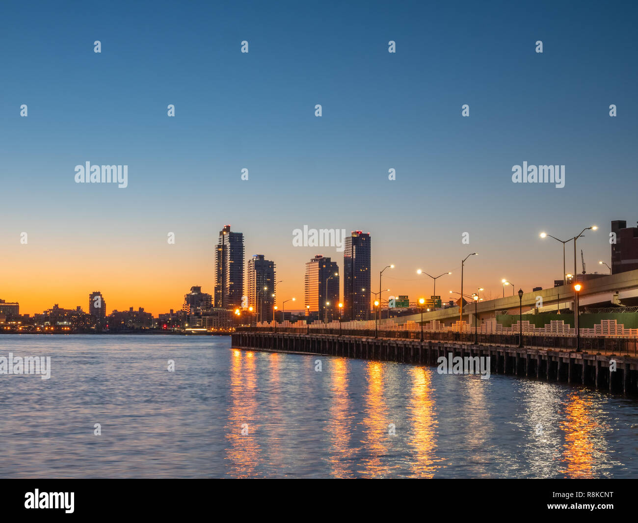 View of the FDR Highway At Sunrise With New York Skyline in the ...