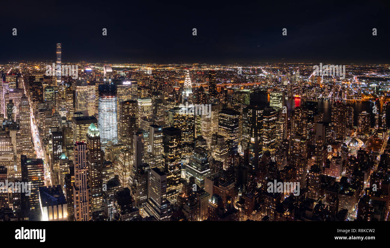 Night View of the Chrysler Buidling With the Queensborough Bridge in ...