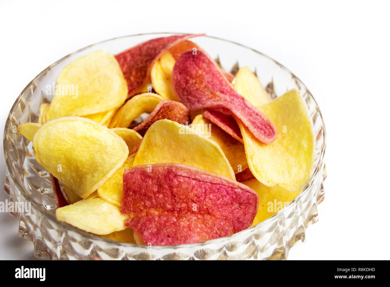 Red and Yellow Potato chips snack on a pile Stock Photo - Alamy