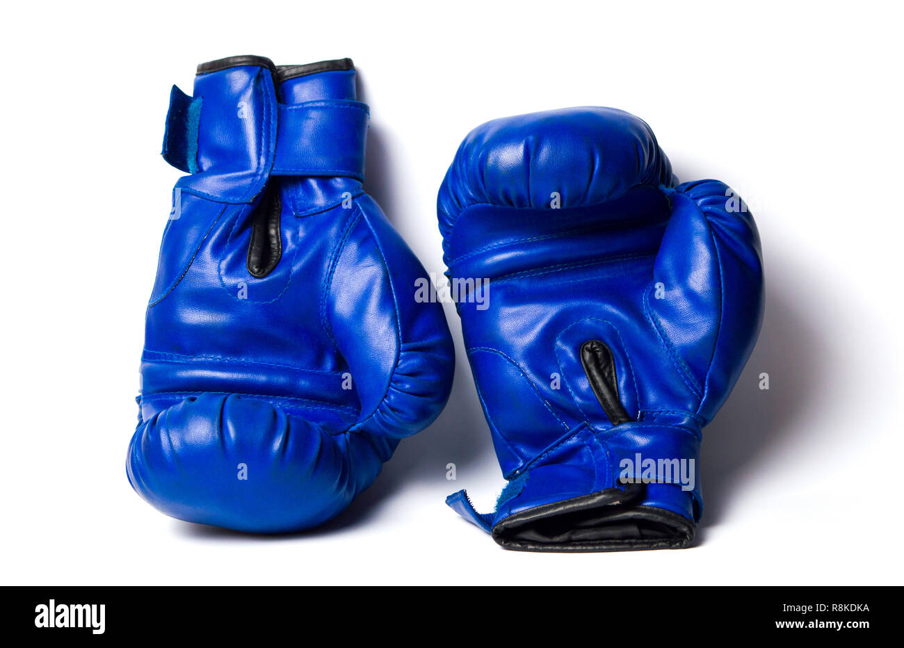 Two blue boxing gloves isolated on white background Stock Photo - Alamy
