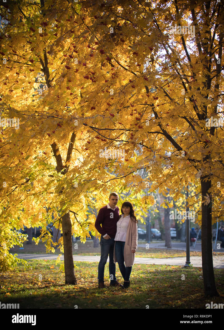Happy couple among trees hi-res stock photography and images - Alamy