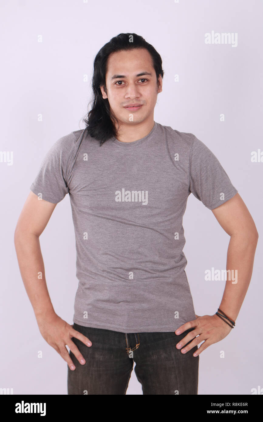 Photo image of an Asian Model smiling and showing blank grey T-Shirt ...