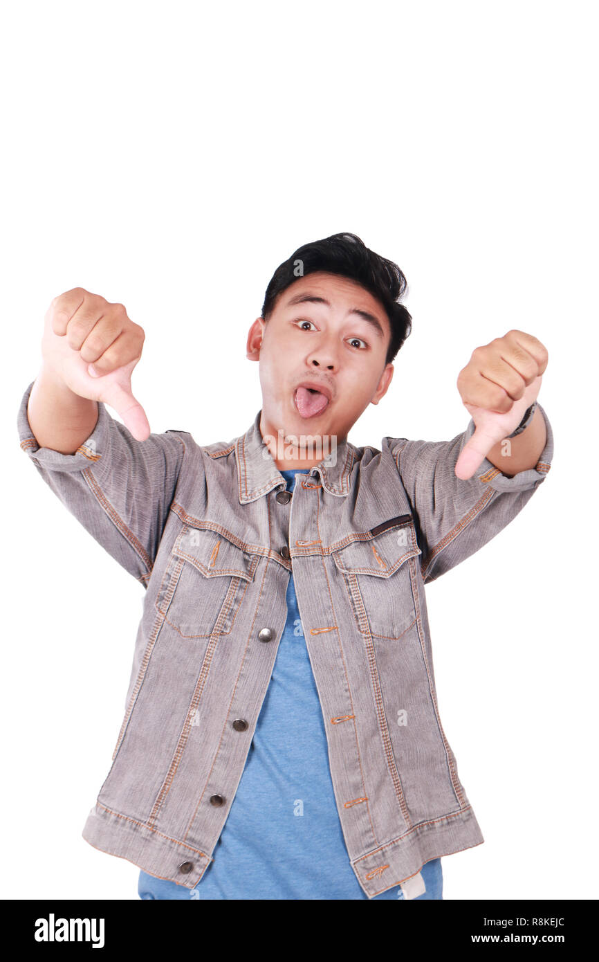 Photo image portrait of a cute young Asian man doing mocking gesture ...