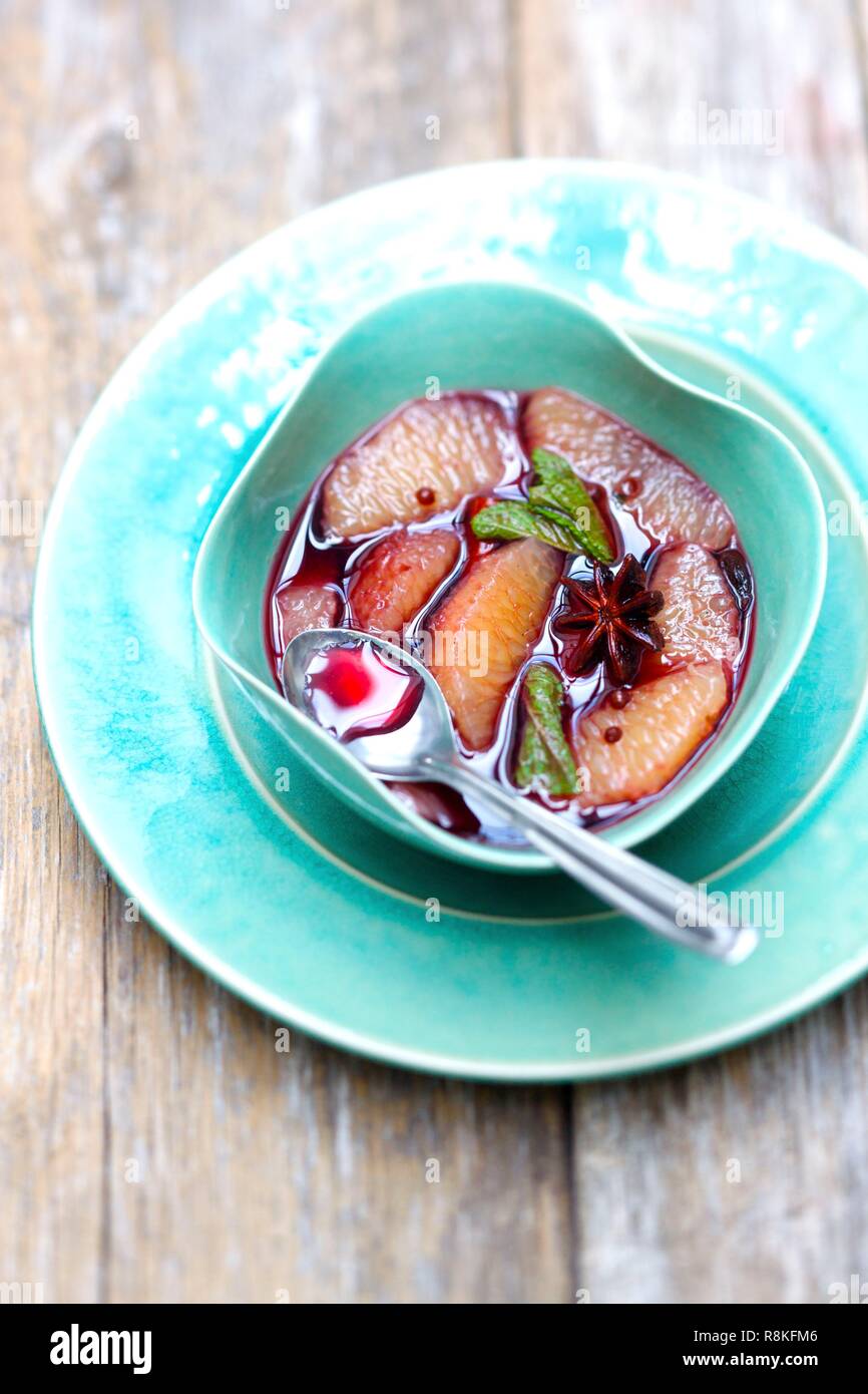 Grapefruit supreme recipe with red wine syrup Stock Photo - Alamy