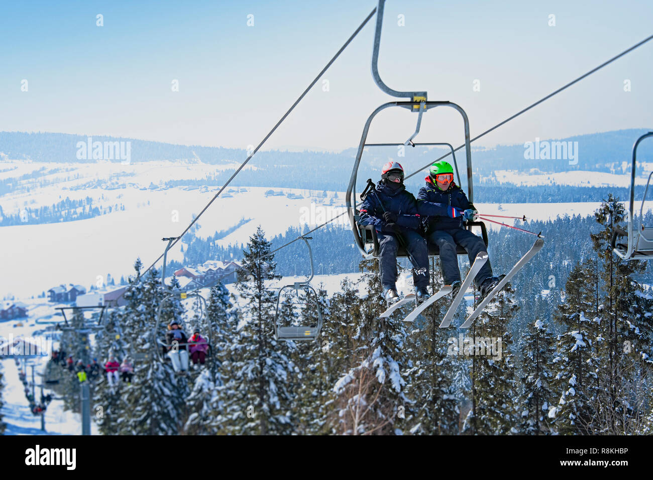 Skiers on lift hi-res stock photography and images - Alamy