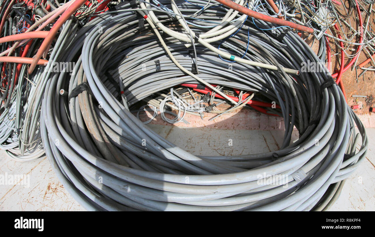 big black electric cable in a container of a landfill Stock Photo - Alamy