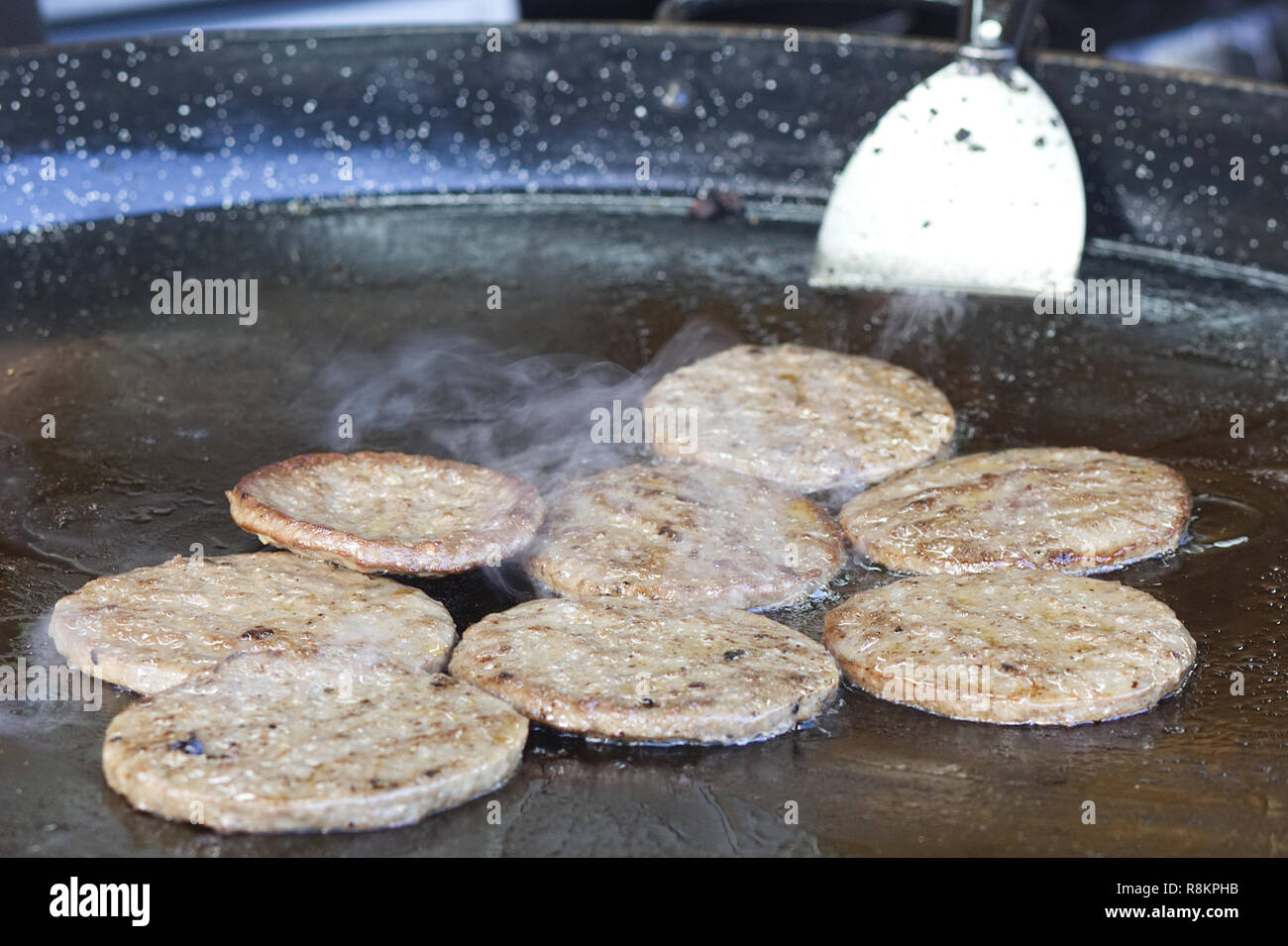 How to cook a beef burgers hi-res stock photography and images - Alamy