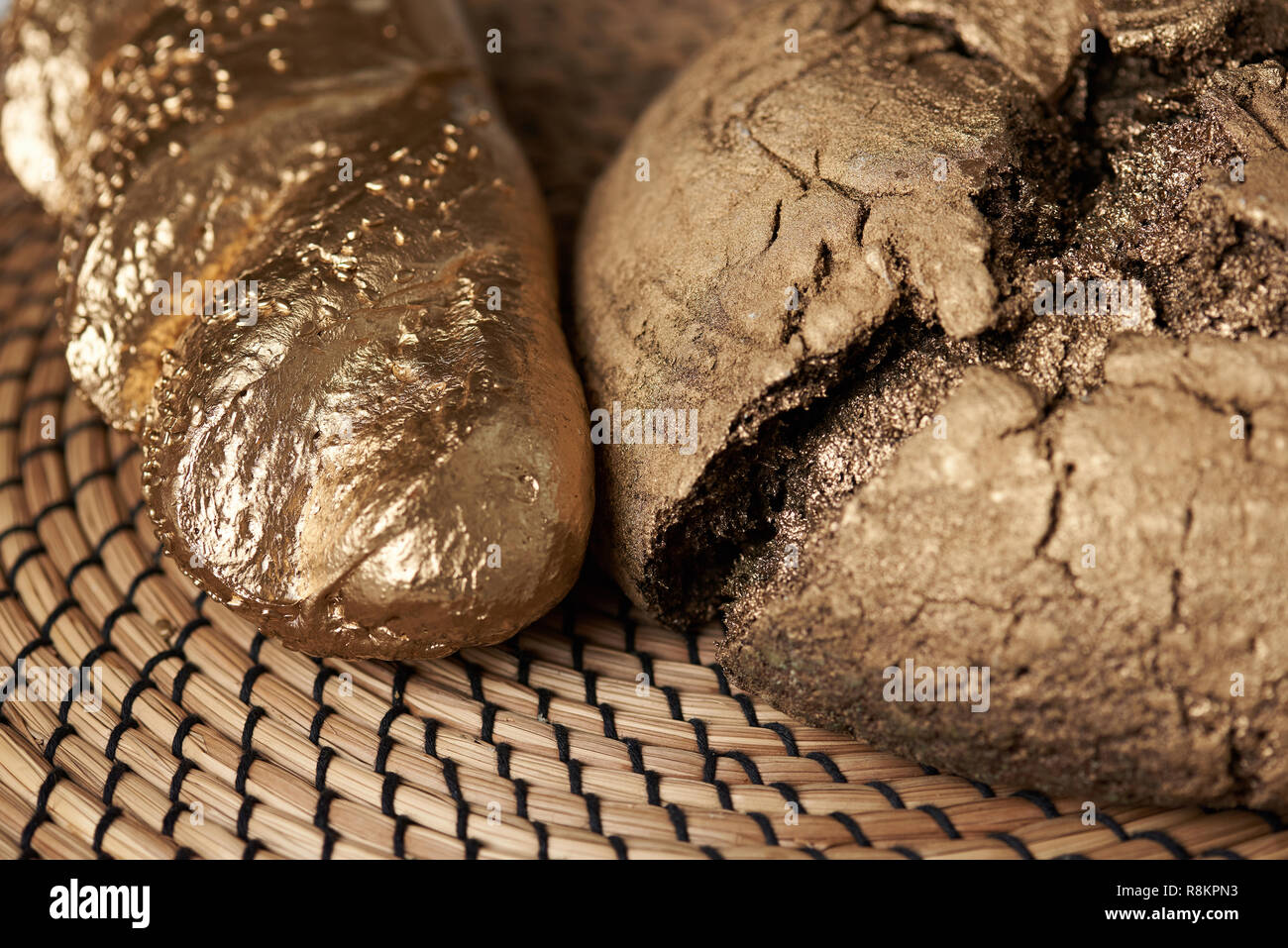 Golden bread theme. Luxury gold food concept Stock Photo - Alamy