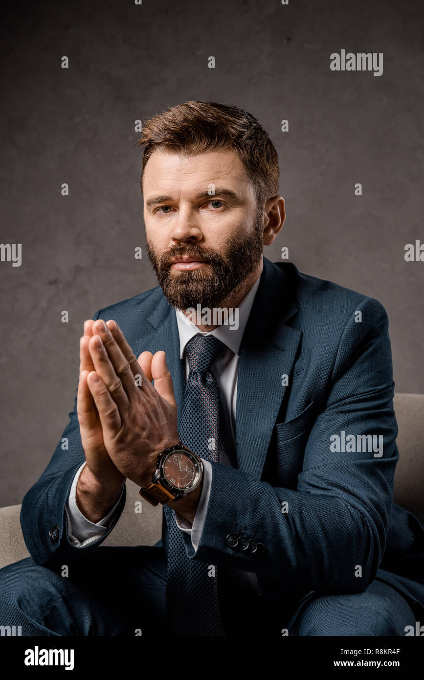 Handsome adult businessman praying hi-res stock photography and images ...