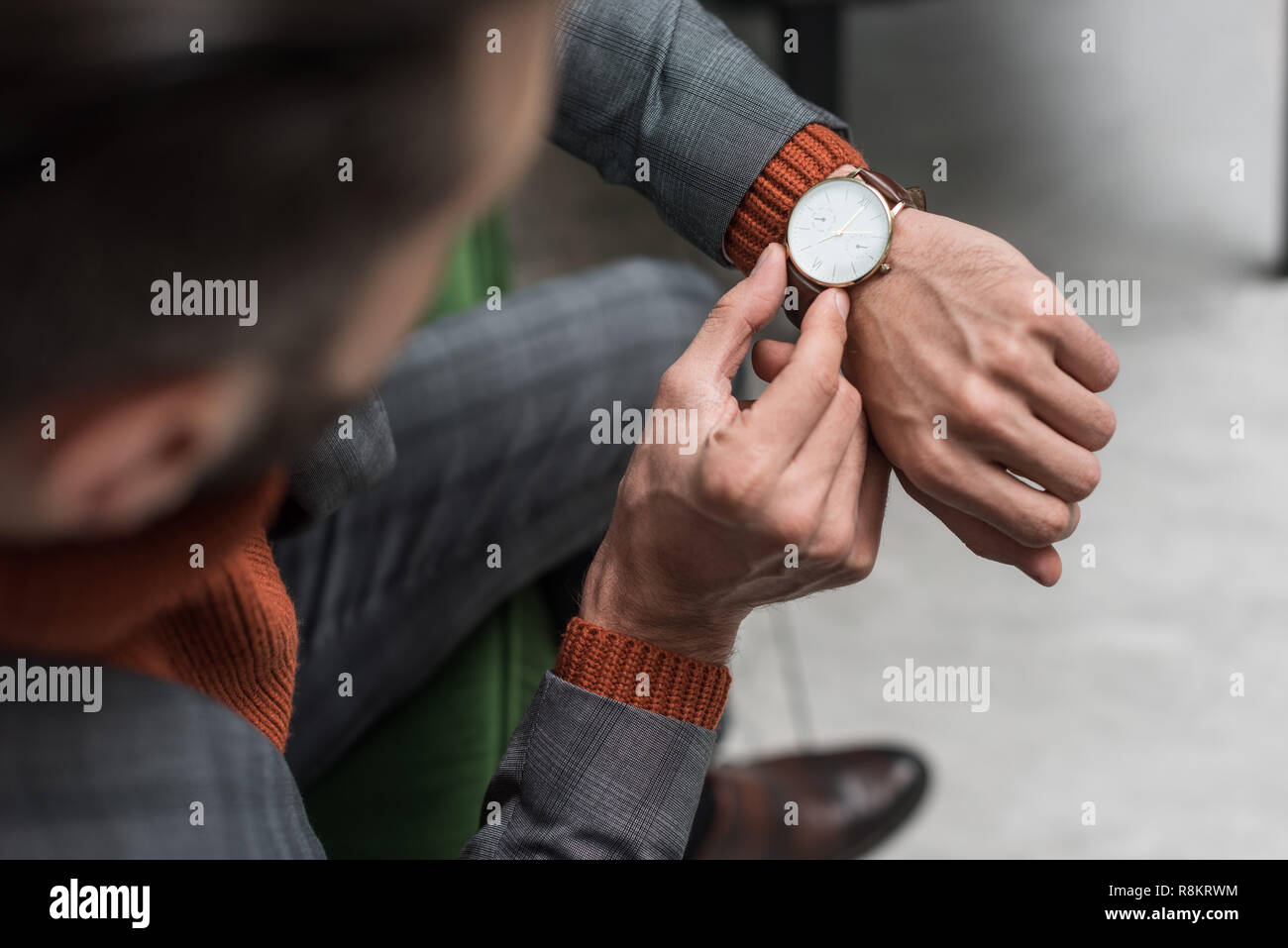 close up view of man in formal wear adjusting watch on hand Stock Photo ...