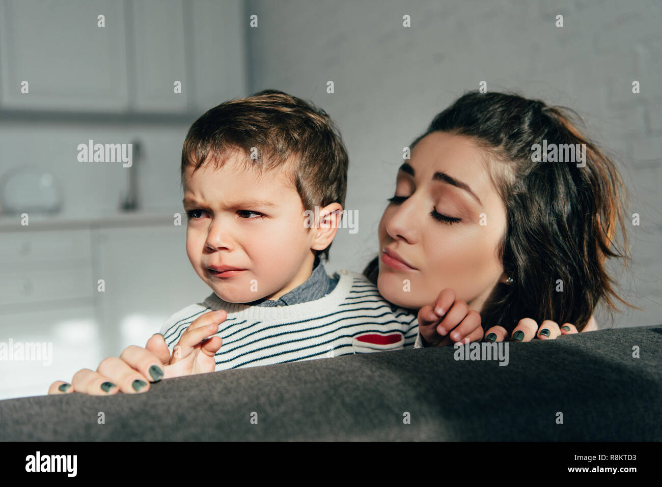 Mom and son crying hi-res stock photography and images - Alamy