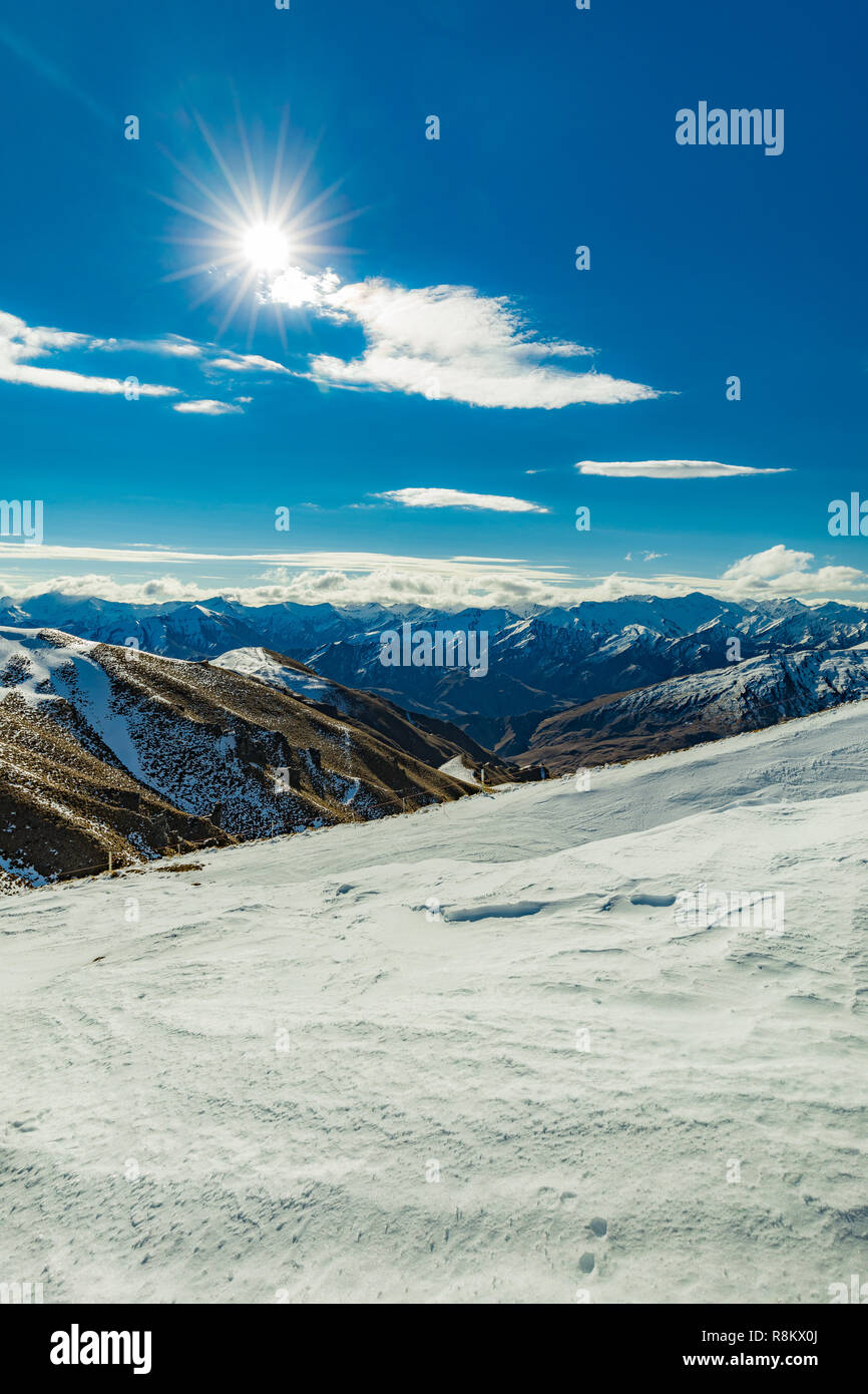 New Zealand mountain panorama and snow ski slopes as seen from Coronet ...