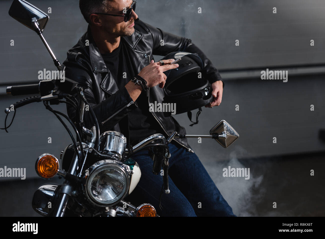 Smoking in leather biker jacket hi-res stock photography and images - Alamy